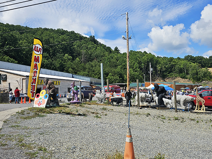 Mountain market magic. Route 52's wooden entrance with fluttering flags sets the stage for a day of discoveries in the heart of Bluefield.