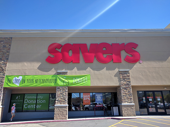 Sunshine highlights Savers' bold red signage &ndash; a siren call to bargain hunters across the Salt Lake Valley.