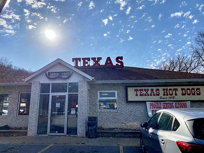 The simple brick building housing Texas Hot Dogs has witnessed over a century of satisfied customers. If walls could talk, they'd say "Get the chili sauce!" 