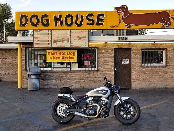 By day, a humble brick building. By night, a neon hot dog paradise. The Dog House serves breakfast that rivals its famous franks!