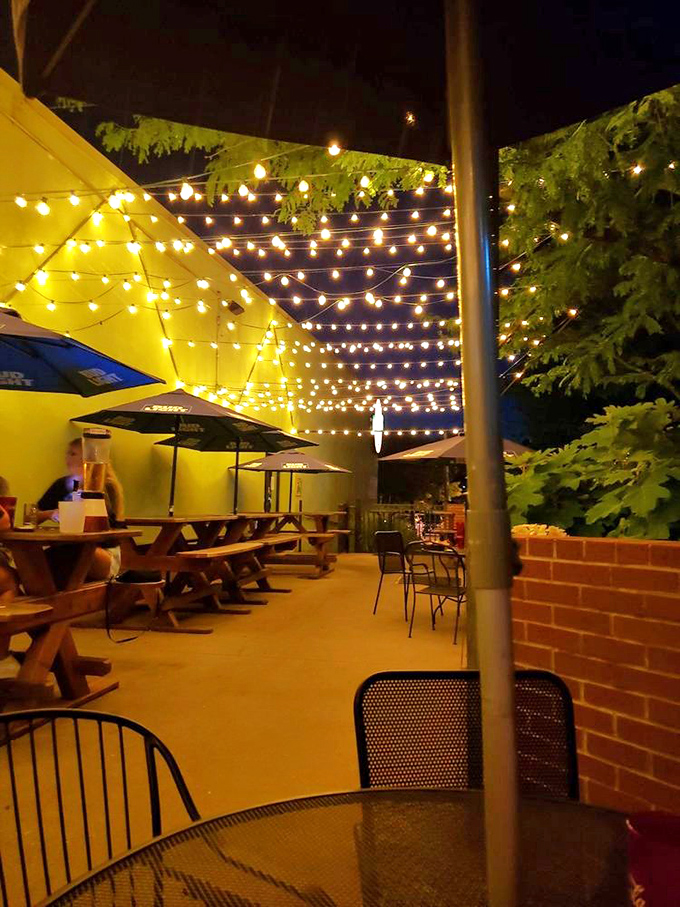 String lights transform Grub's patio into a magical realm where burger dreams come true. Dinner and a light show &ndash; no extra charge.