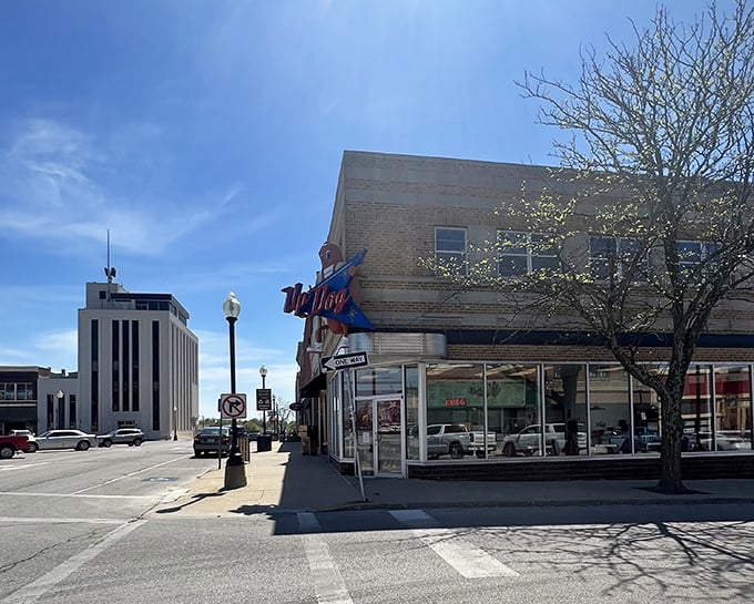 That cheeky hot dog character riding the blue arrow isn't just cute&mdash;it's pointing you toward flavor town in historic Independence