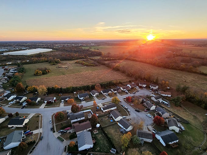 Sunlight bathes Versailles' Main Street in golden hues, highlighting architecture that's stood since Kentucky's early days.
