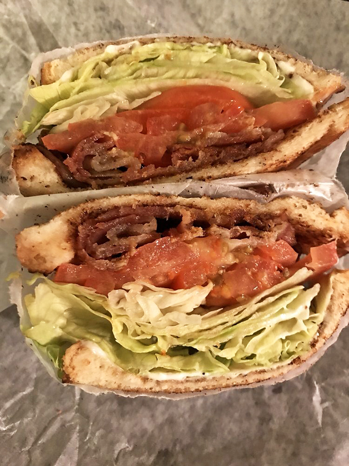 Layer upon layer of BLT perfection&mdash;where crisp lettuce, juicy tomato, and bacon that means business come together in sandwich harmony.