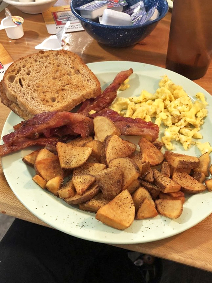 Breakfast that doesn't need a filter. Those home fries are speaking a language of comfort that requires no translation.