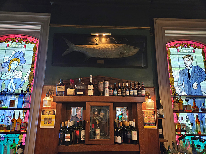 Stained glass and taxidermy create a bar atmosphere unlike any sports pub you've visited. That fish probably has witnessed more confessions than a priest.