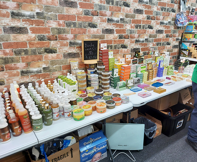 Handmade soaps and body products arranged against exposed brick&mdash;artisanal self-care that whispers "treat yourself" without shouting at your budget.