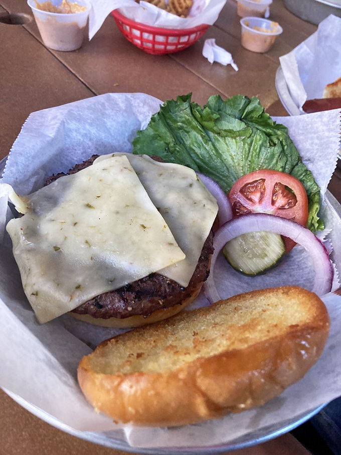 A naked burger awaiting its destiny. Some food moments are so intimate, they deserve a moment of silent appreciation before the first bite.