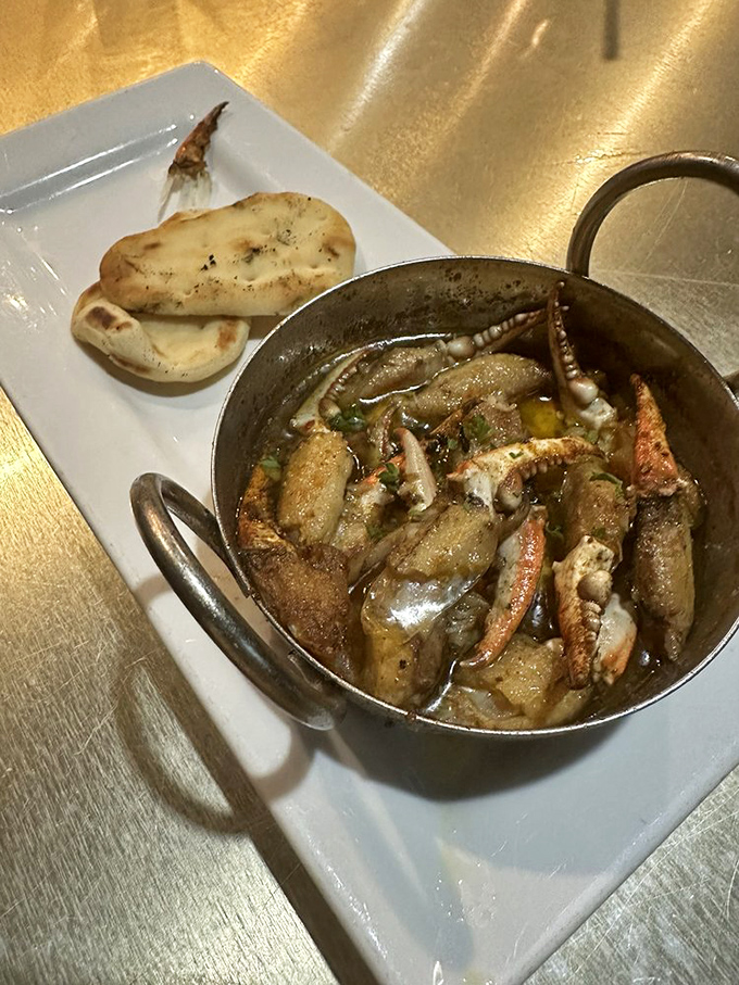 Blue crab fingers in garlicky butter served with warm pita bread. A dish so good you'll momentarily forget you're in polite company.