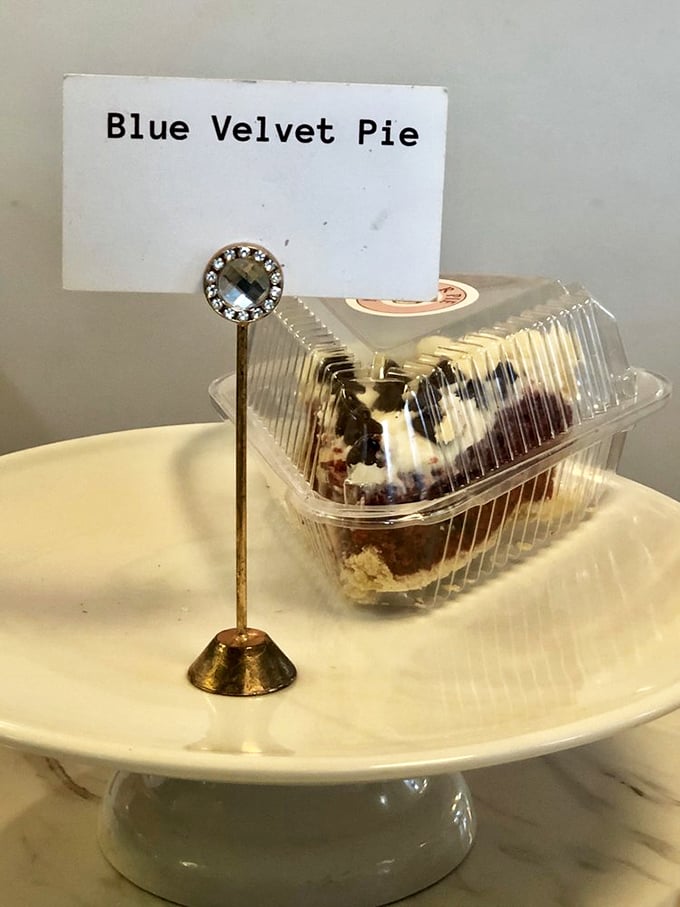 Blue Velvet Pie awaits its next victim. The jeweled stand holder adds a touch of ceremony to what will be a very brief existence.