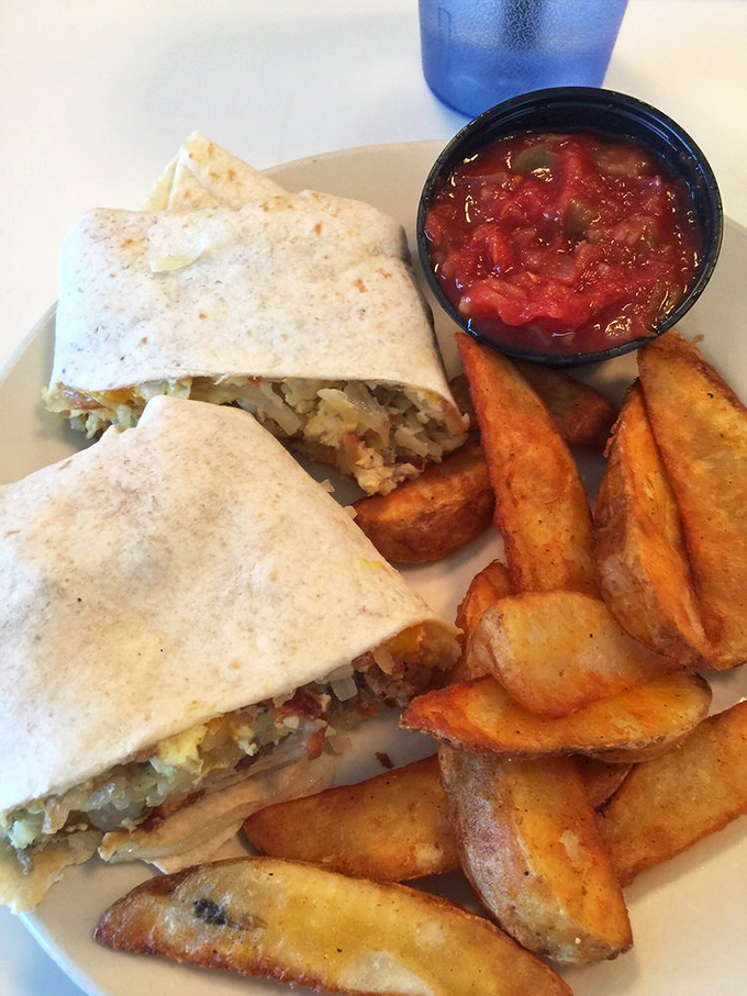 Breakfast burritos: where tortillas fulfill their destiny by embracing eggs and potatoes in a warm hug that comes with a side of salsa therapy.