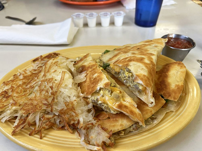 Breakfast quesadilla with crispy hash browns&mdash;proof that morning excellence comes in many delicious forms.