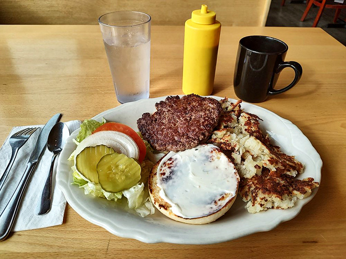 A burger that demands two hands and your full attention. Paired with those famous hash browns, it's the lunch equivalent of winning the lottery.