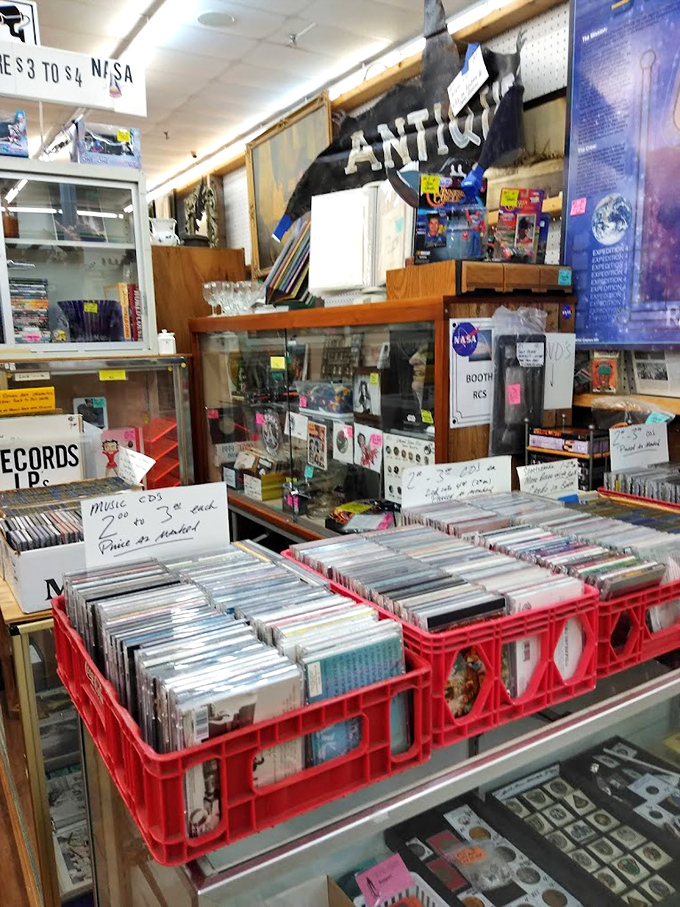 Vinyl records and NASA memorabilia share space in this corner of the mall, where the soundtrack of history meets the history of space.