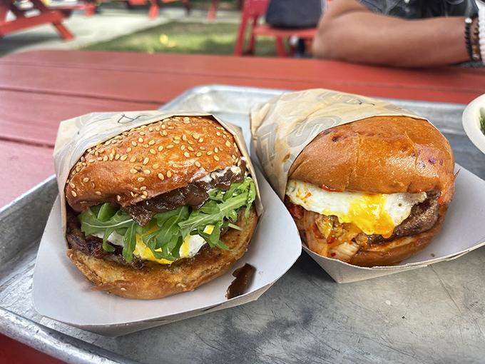 The California and Kimchi burgers side-by-side&mdash;proof that Gott's respects tradition while flirting shamelessly with culinary innovation.