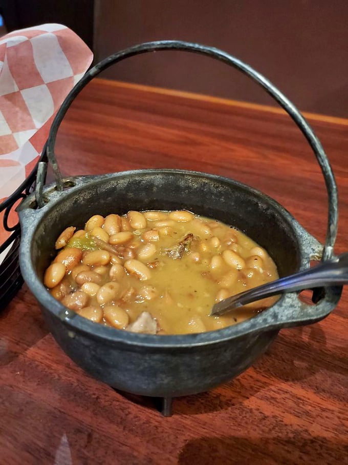 Campfire beans served in a mini cauldron&mdash;like what cowboys might have eaten if cowboys had access to really good recipes.