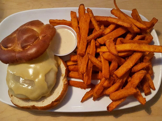 This isn't just a cheeseburger on a pretzel bun&mdash;it's a cultural exchange program happening right on your plate. The creamy dipping sauce seals the international deal.