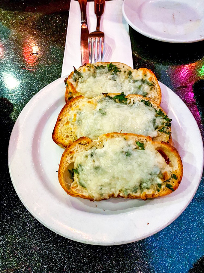 Garlic bread so perfectly toasted and cheese-draped it deserves its own Instagram account. #CarbsWorthIt
