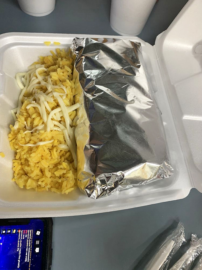 Yellow rice that's actually flavorful (a minor miracle) serves as the perfect backdrop for this burrito that doesn't need to shout its authenticity &ndash; it just is.