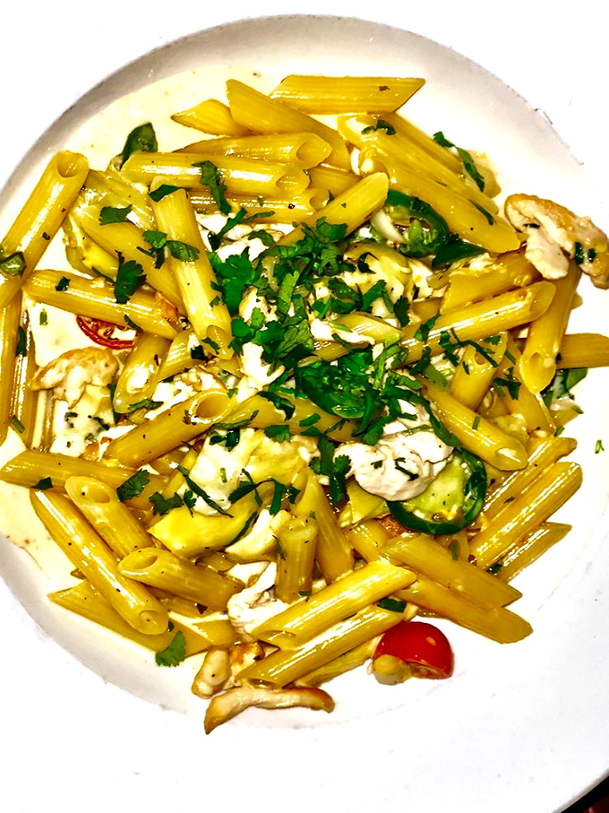 Penne bathed in a sunshine-yellow sauce with fresh herbs&mdash;proof that pasta doesn't need red sauce to steal the spotlight.
