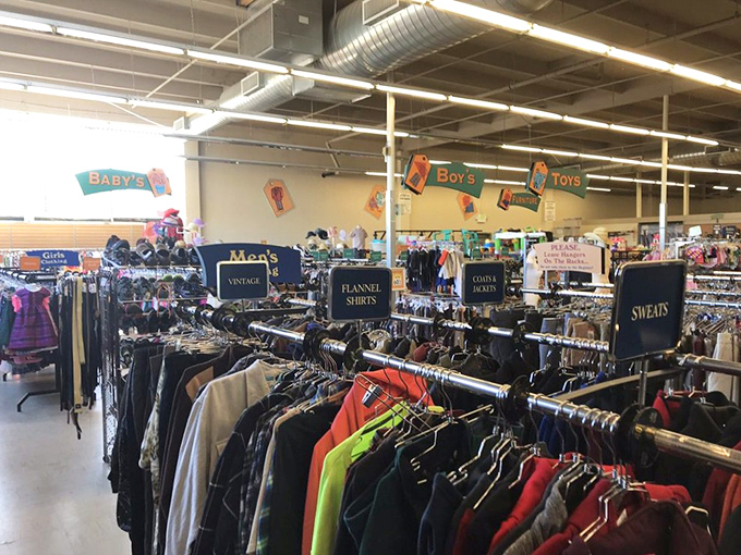 Department store organization meets garage sale prices. The clothing section's helpful signs guide you through this fabric forest of fashion history.