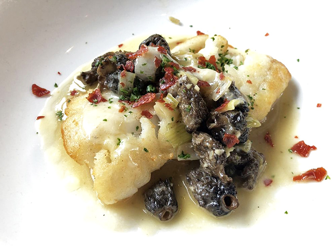 Delicate cod elevated by morel mushrooms and a buttery sauce. This dish whispers "fine dining" without shouting about its pedigree.