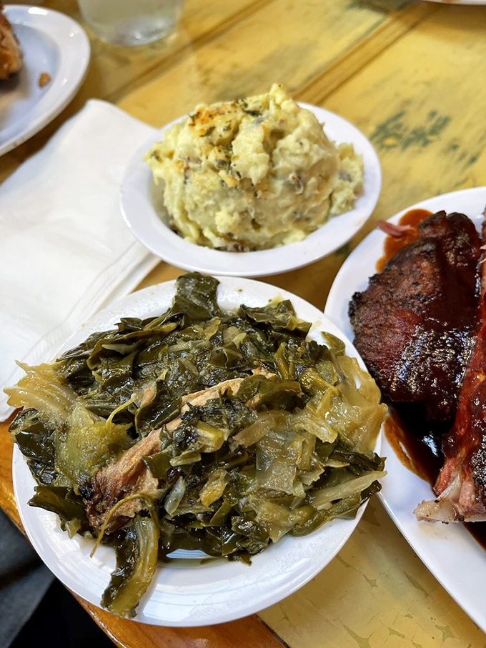 These collard greens have clearly been simmering with purpose &ndash; tender, flavorful, and the perfect counterpoint to all that smoky meat.