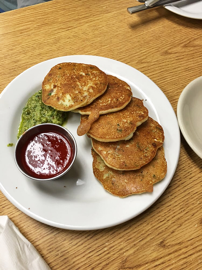 These corn cakes aren't just pancakes with an identity crisis&mdash;they're deliberately delicious discs of Southern ingenuity with perfect golden edges.