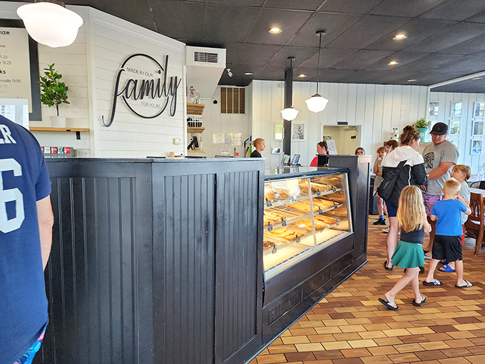 The counter where dreams come true. That "Made by our family for yours" sign isn't just decoration&mdash;it's the Dewster's philosophy in seven perfect words. 