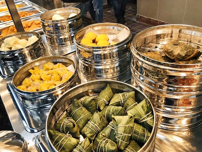 Steamed dumplings sitting pretty, waiting to be claimed. Like little edible gift packages where the wrapping is as delicious as what's inside. 