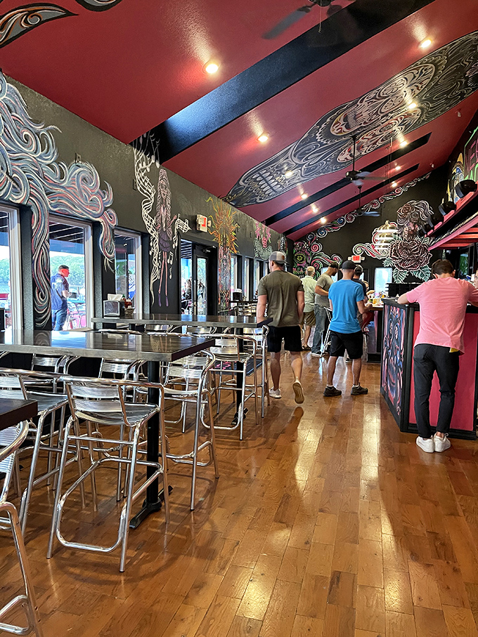 Artful murals, warm wood floors, and a vibe that says "stay awhile" &ndash; the dining area feels like a secret you want to share.