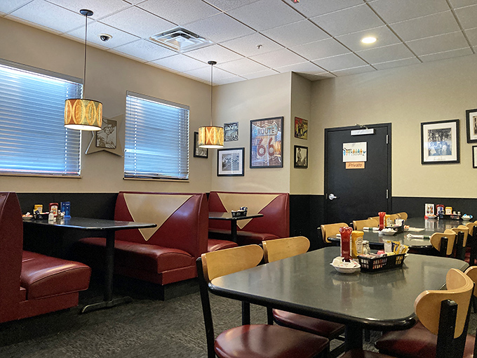 Red booth seating, pendant lighting, and enough nostalgic decor to make you think you've time-traveled to simpler days of bottomless coffee.
