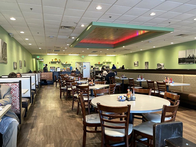 Not just tables and chairs, but the stage where breakfast dreams come true. Note the ceiling's gentle glow&mdash;like a spotlight for your pancakes.