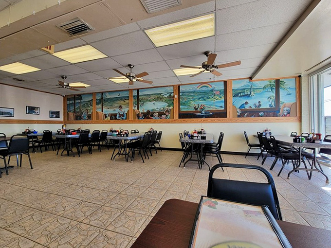 The dining area's mural celebrates Keys life, while ceiling fans ensure your pancake-induced food coma happens in perfect climate-controlled comfort.