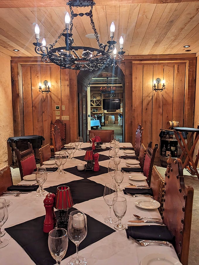 Another private dining room where wood paneling and chandeliers create the perfect backdrop for both business deals and marriage proposals.