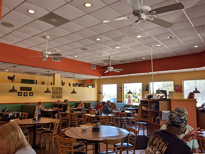 The dining room hums with breakfast energy as ceiling fans lazily spin overhead, creating the perfect atmosphere for morning conversations and pancake contemplation.