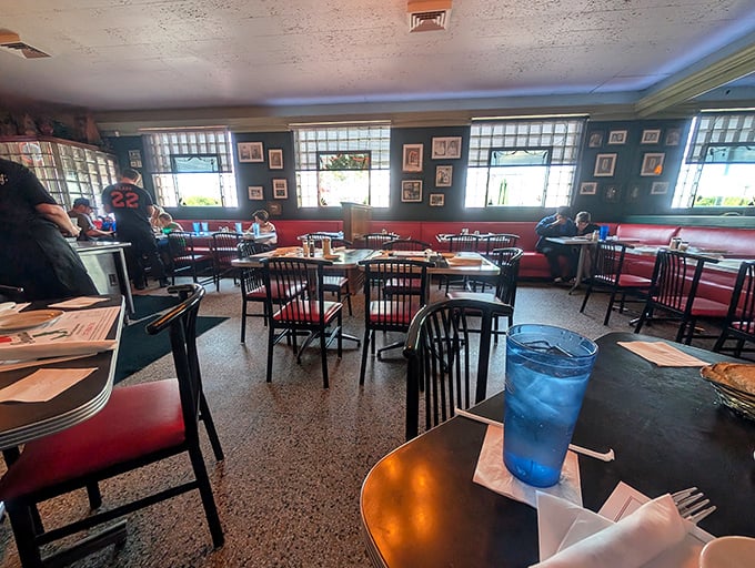 The dining room hums with conversation while framed memories line the walls&mdash;a space where calories don't count and diet plans go to die.