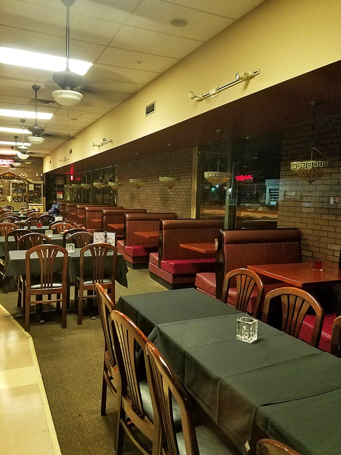 Red booths and dark tablecloths create that classic Italian restaurant vibe where you instantly know you're in for a meal that won't disappoint.