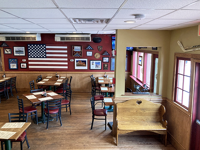 The dining room feels like America's living room. That flag-adorned wall isn't just decoration&mdash;it's a backdrop for countless celebrations and comfort food revelations.