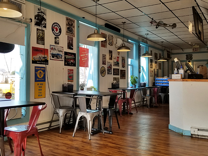 The dining area's vintage gas pump candy dispenser stands guard like a colorful sentinel from America's roadside past.