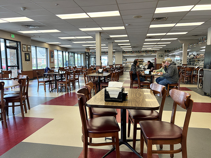The checkerboard floor guides you through a cafeteria-style sanctuary where Jewish deli traditions thrive in the Hoosier heartland.