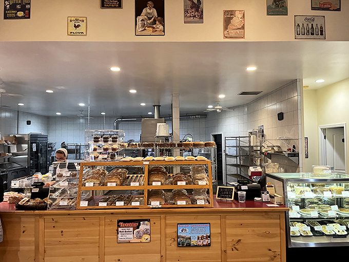 Behind the counter, where baking magic happens in full view. Like watching live theater, except the performers are pastries and the audience always applauds.