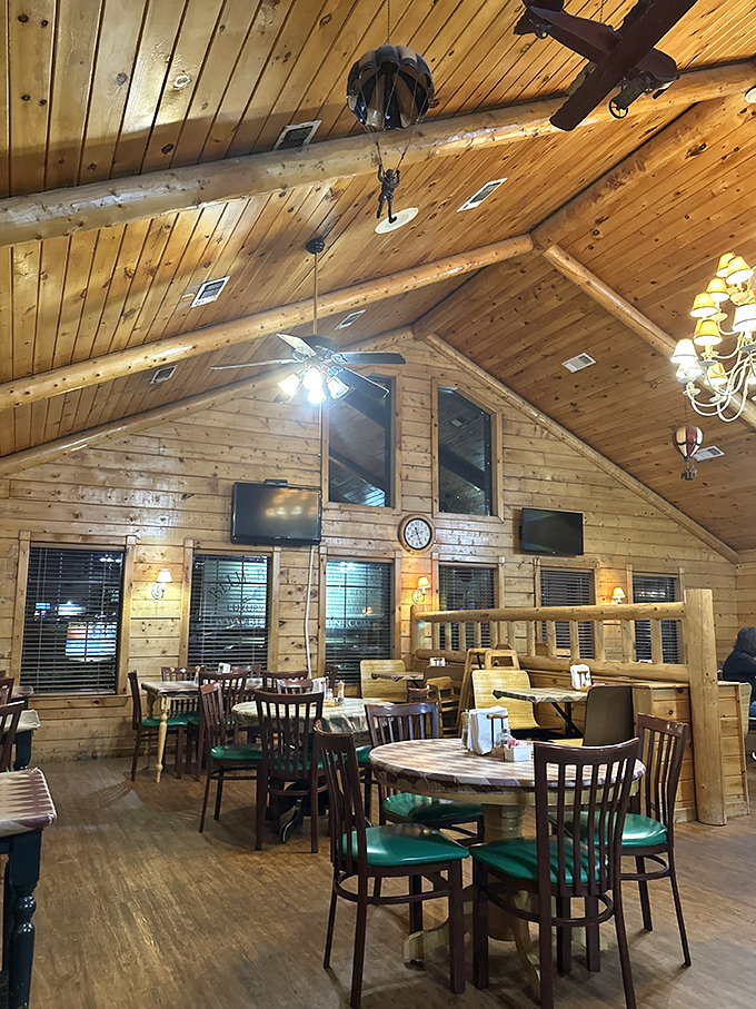 No interior designer needed when you've got log walls, wooden beams, and the promise of great steaks. The vaulted ceiling makes room for all your carnivorous dreams.