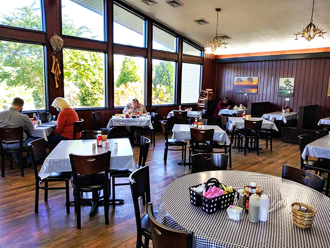Sun-drenched dining with black-and-white checked tables where lifetime memories are made between bites of Southern classics.