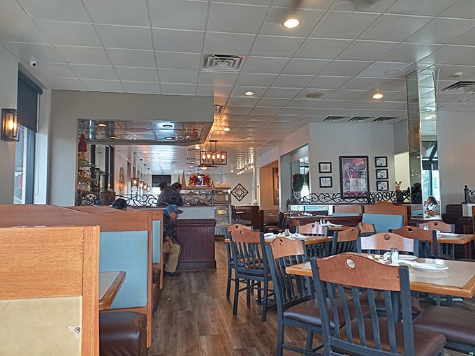 The dining room where strangers become neighbors, sharing nothing but space and the universal language of "mmm" and "ahhh."