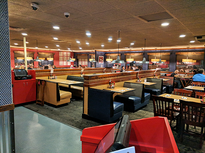 Booths and tables fill the spacious dining room, where conversations and silverware create the soundtrack of community gathering.