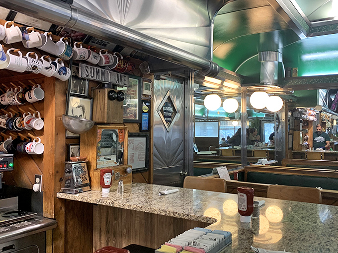 That magical diner counter where strangers become neighbors and the choreography of short-order cooking unfolds before your eyes.