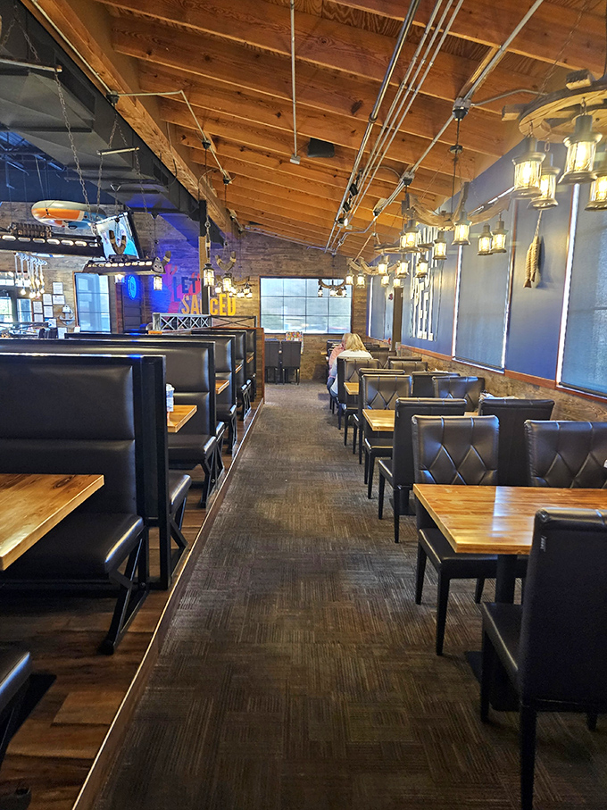 The dining area balances nautical charm with Midwestern comfort—like if a ship captain decorated with help from your stylish aunt.