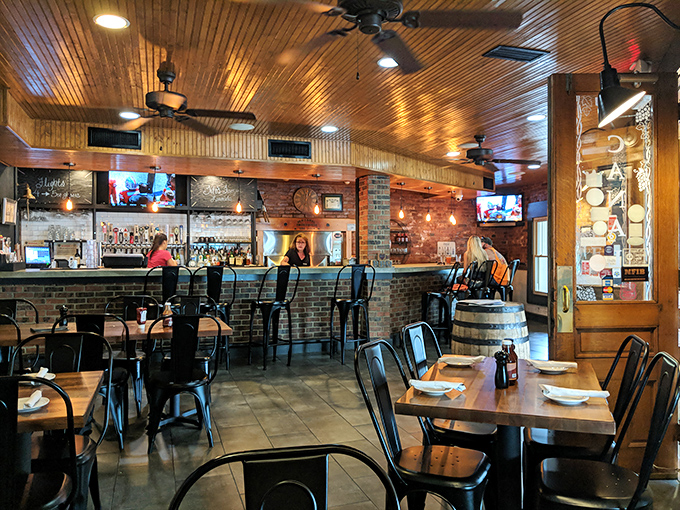 The dining area strikes that perfect balance between "nice enough for date night" and "casual enough to lick your fingers without judgment."