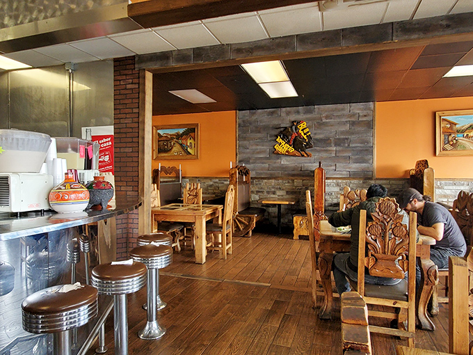 Rustic wooden chairs carved with traditional designs and warm orange walls transport you straight to central Mexico &ndash; no passport required.